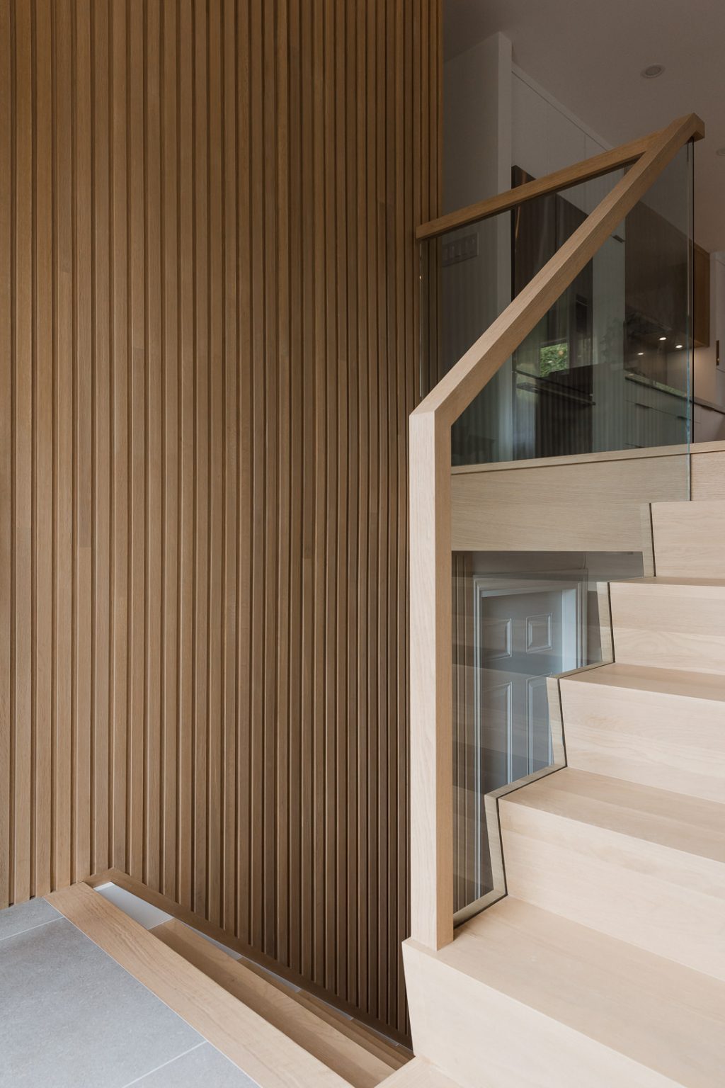 Unique Kitchen, Stunning Glass Railing, and Hidden Closet in Slat Wall ...
